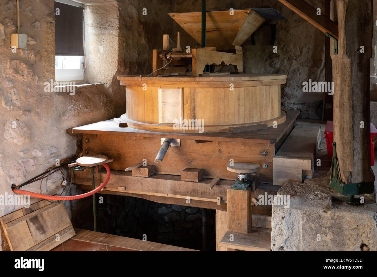 Traditional ancient and working water mill inside a home in France ...
