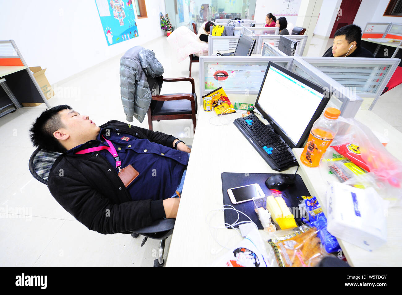 Chinese employee hi-res stock photography and images - Alamy