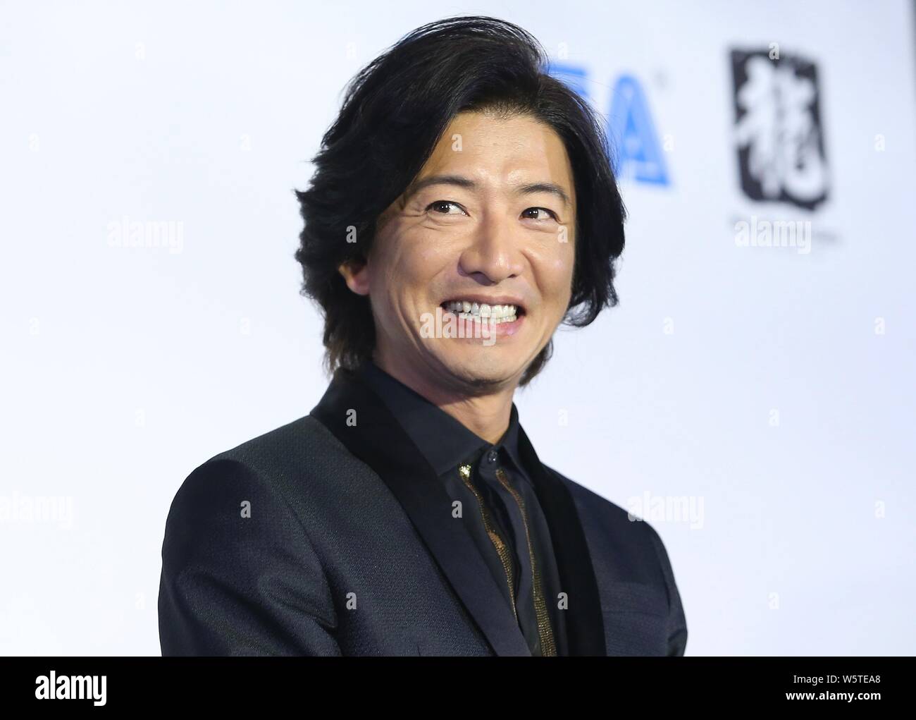 **TAIWAN OUT**Japanese actor and singer Takuya Kimura attends a ...