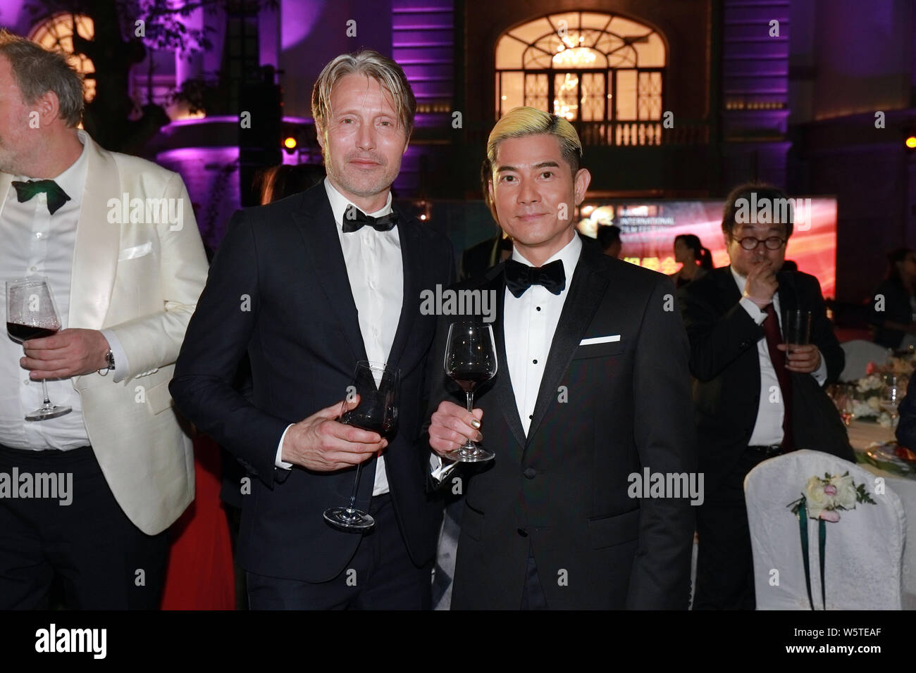 Hong Kong singer and actor Aaron Kwok, right, and Danish actor Mads ...