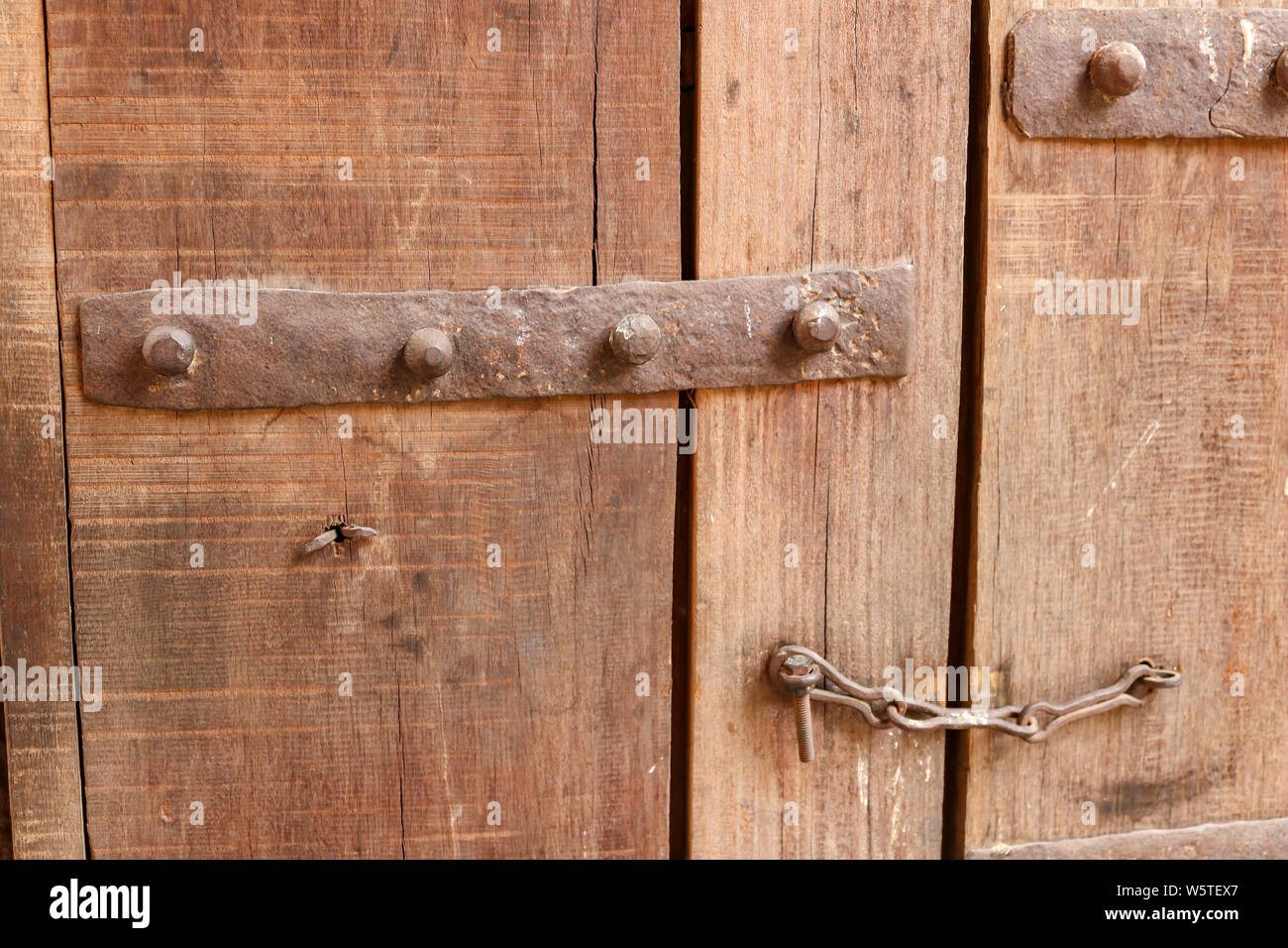 Old wooden entrance gate with iron fittings on the grounds of Humayun's ...