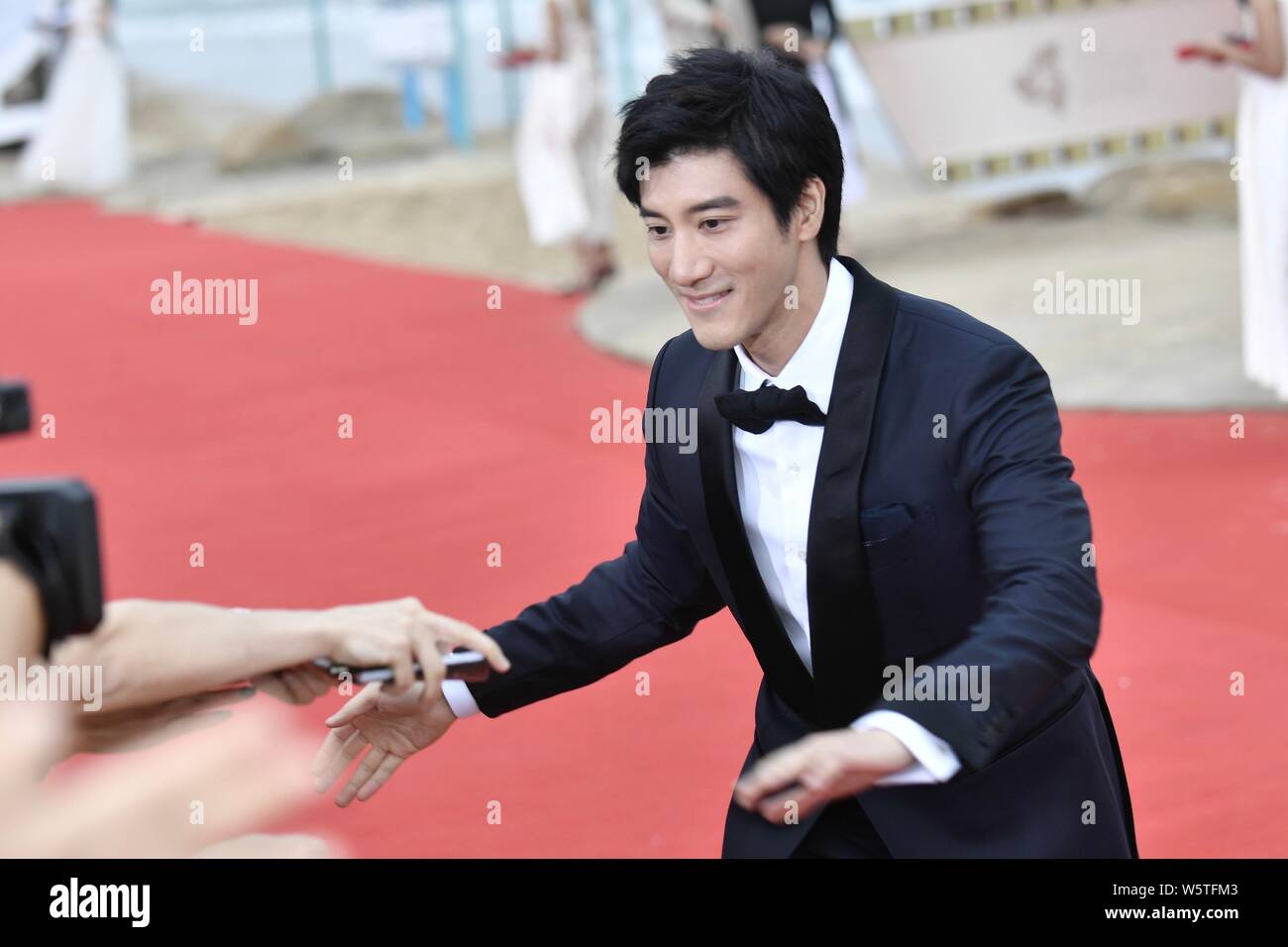 Chinese-American singer-songwriter and actor Wang Leehom arrives on the ...