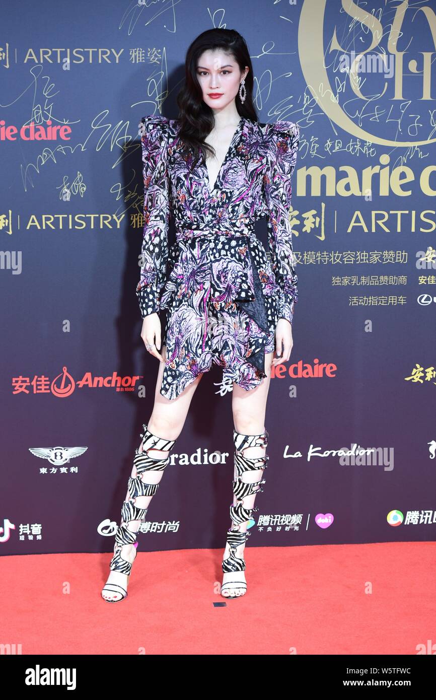 Chinese model He Sui poses as she arrives on the red carpet for the ...