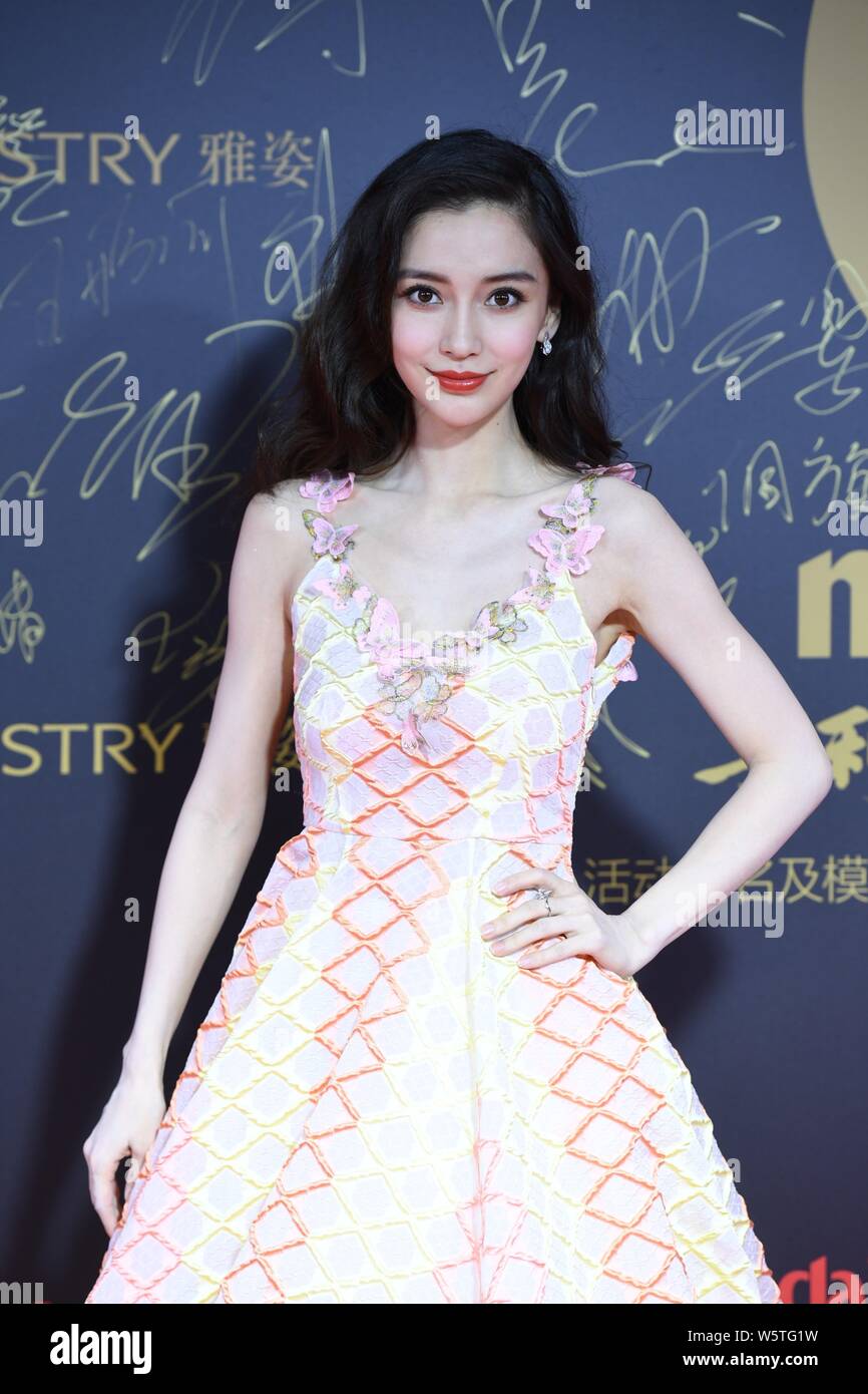 Hong Kong actress Angelababy poses as she arrives on the red carpet for the 2018 Marie Claire ...
