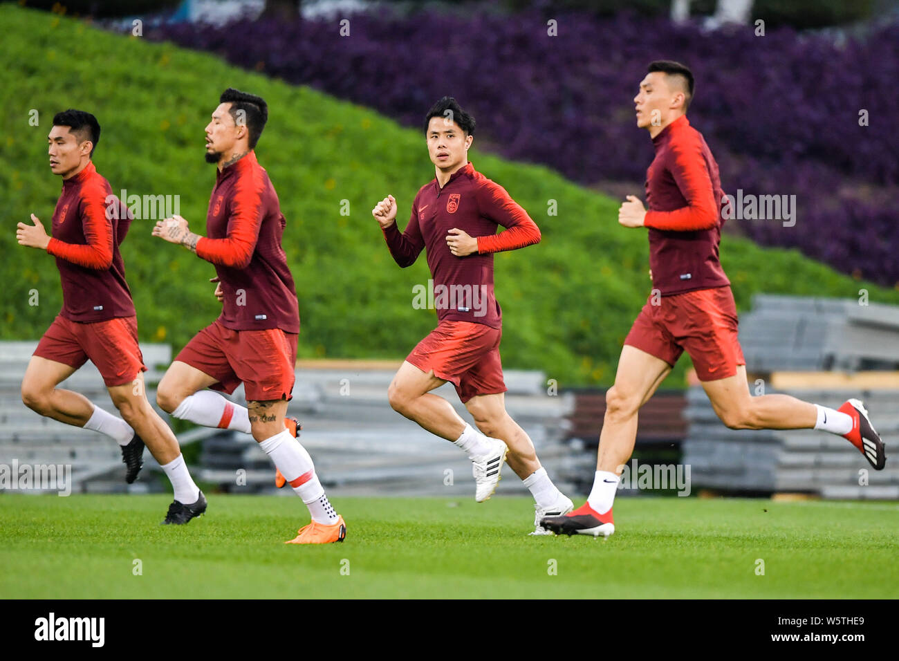 Players of the Chinese national men's football team takes part in a ...