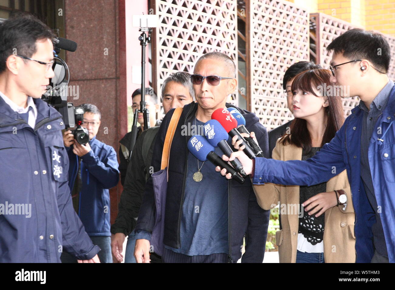 Taiwanese film director Doze Niu appears at a procuratorate for ...