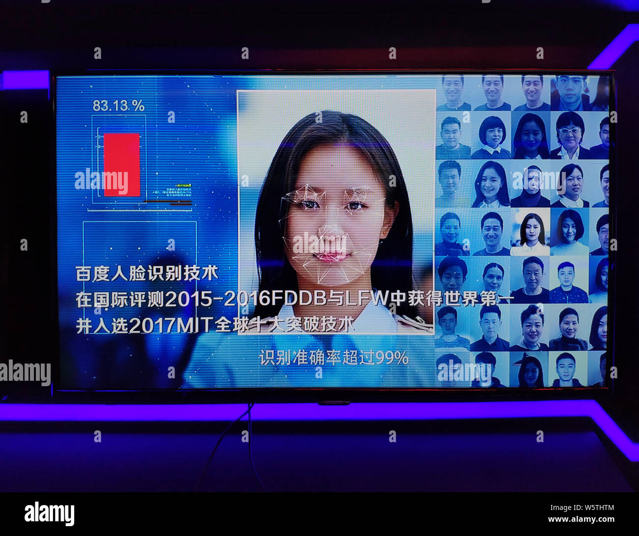 A visitor tries out the face recognition technology at the stand of Baidu during the ELEXCON ...