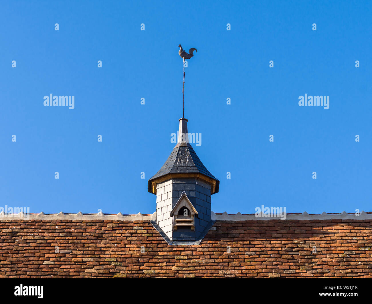 Weathervane and dovecote on chapel - France Stock Photo - Alamy