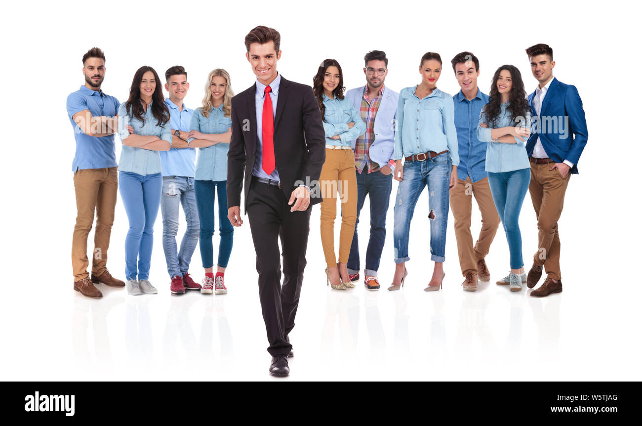 Person standing in moving crowd Cut Out Stock Images & Pictures - Alamy