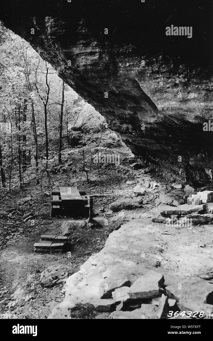 Photograph of Fireplace and Table Under Overhang Rock; Scope and ...
