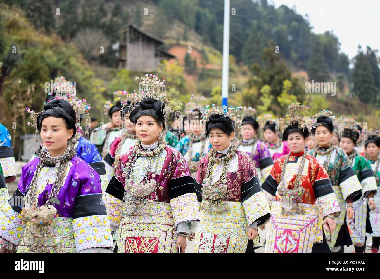 Chinese people of Dong ethnic group dressed in traditional silver ...