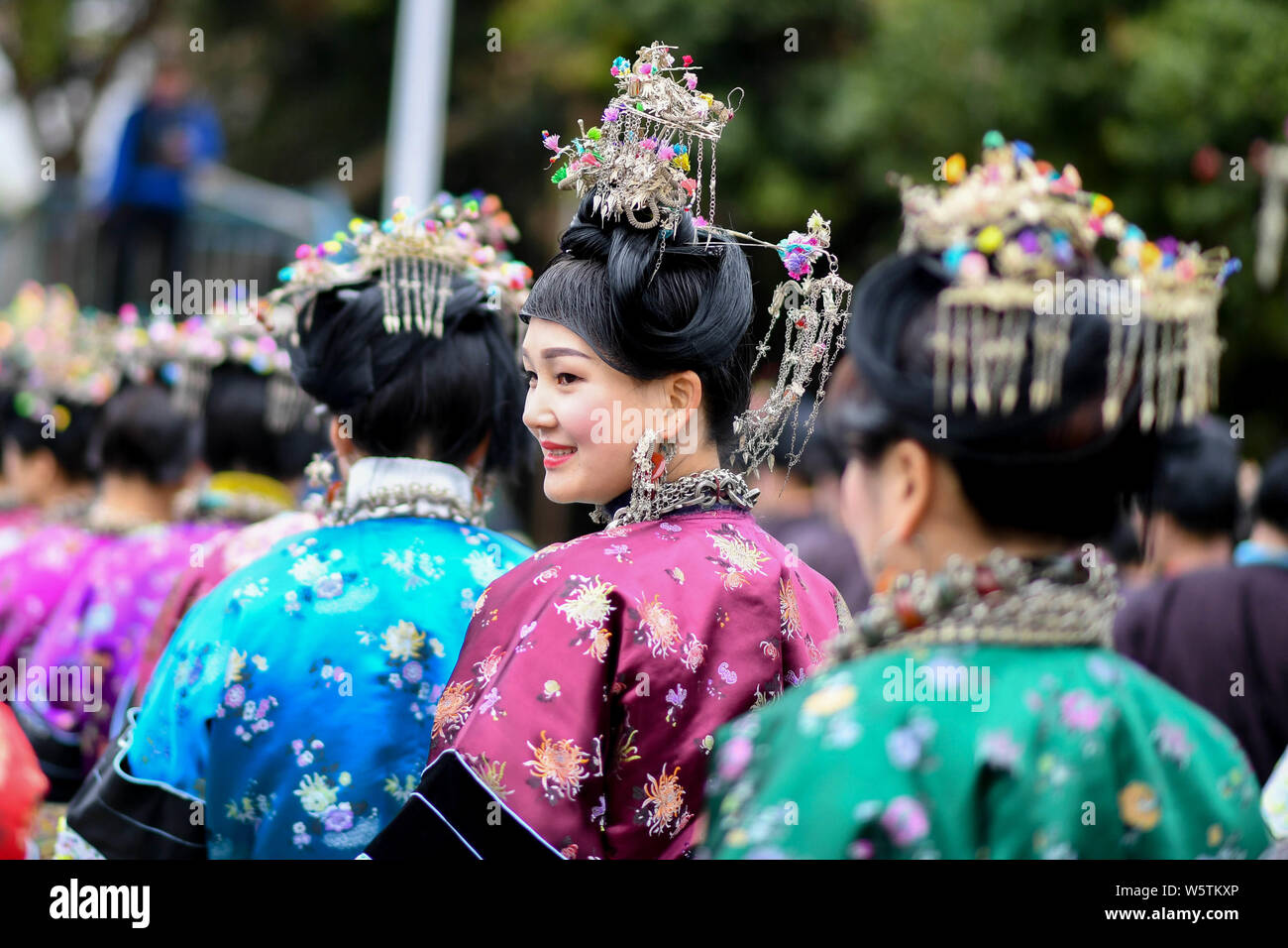 Chinese people of Dong ethnic group dressed in traditional silver ...
