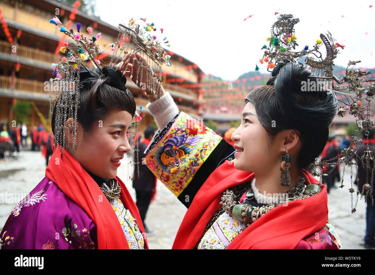Chinese people of Dong ethnic group dressed in traditional silver ...