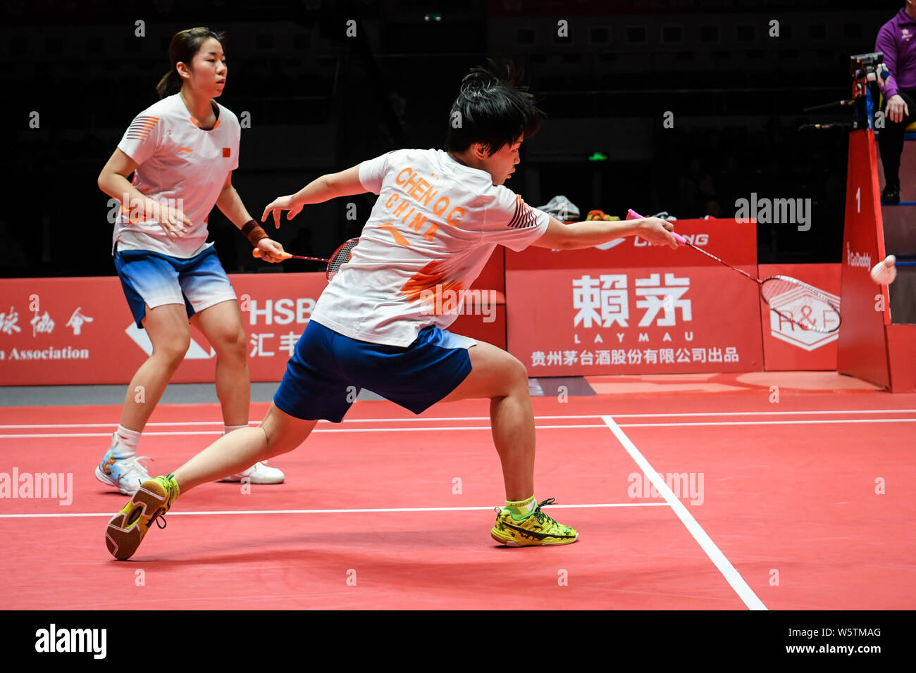 Chen Qingchen and Jia Yifan of China return a shot to Misaki Matsutomo and Ayaka Takahashi of ...
