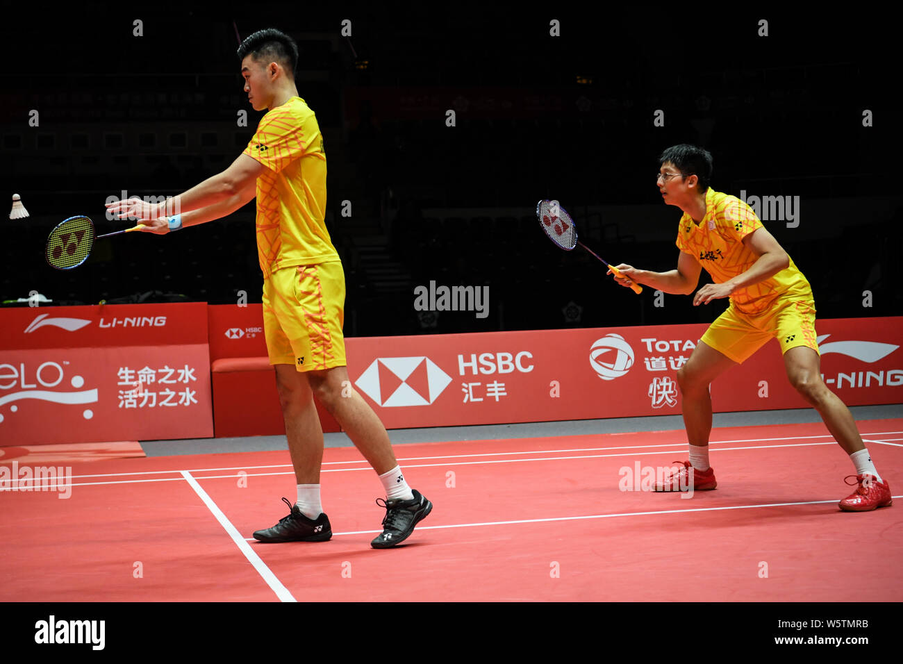 Chen Hung-ling and Wang Chi-lin of Chinese Taipei return a shot to Hiroyuki Endo and Yuta ...