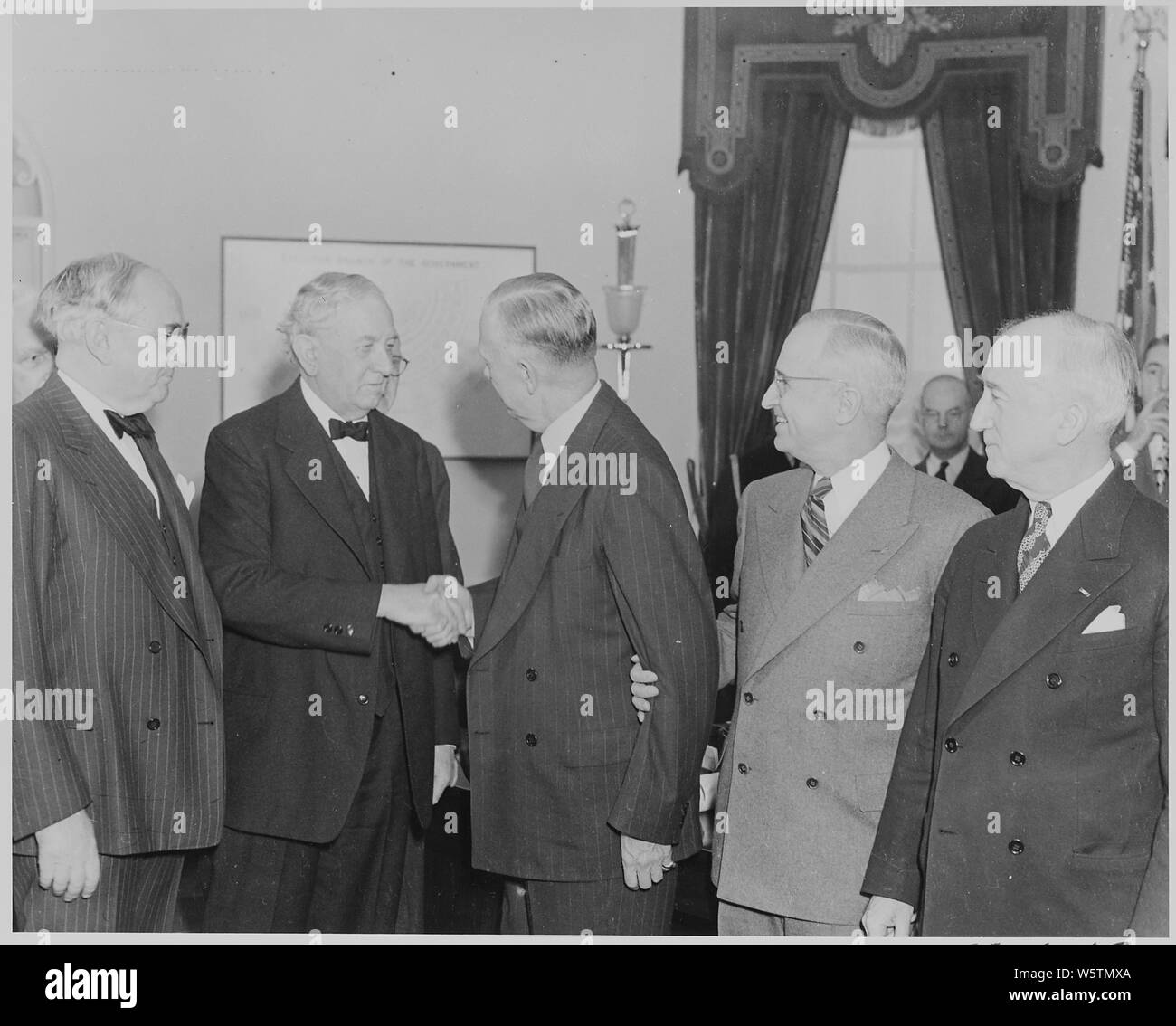Photograph of George C. Marshall shaking hands with Senator Tom ...