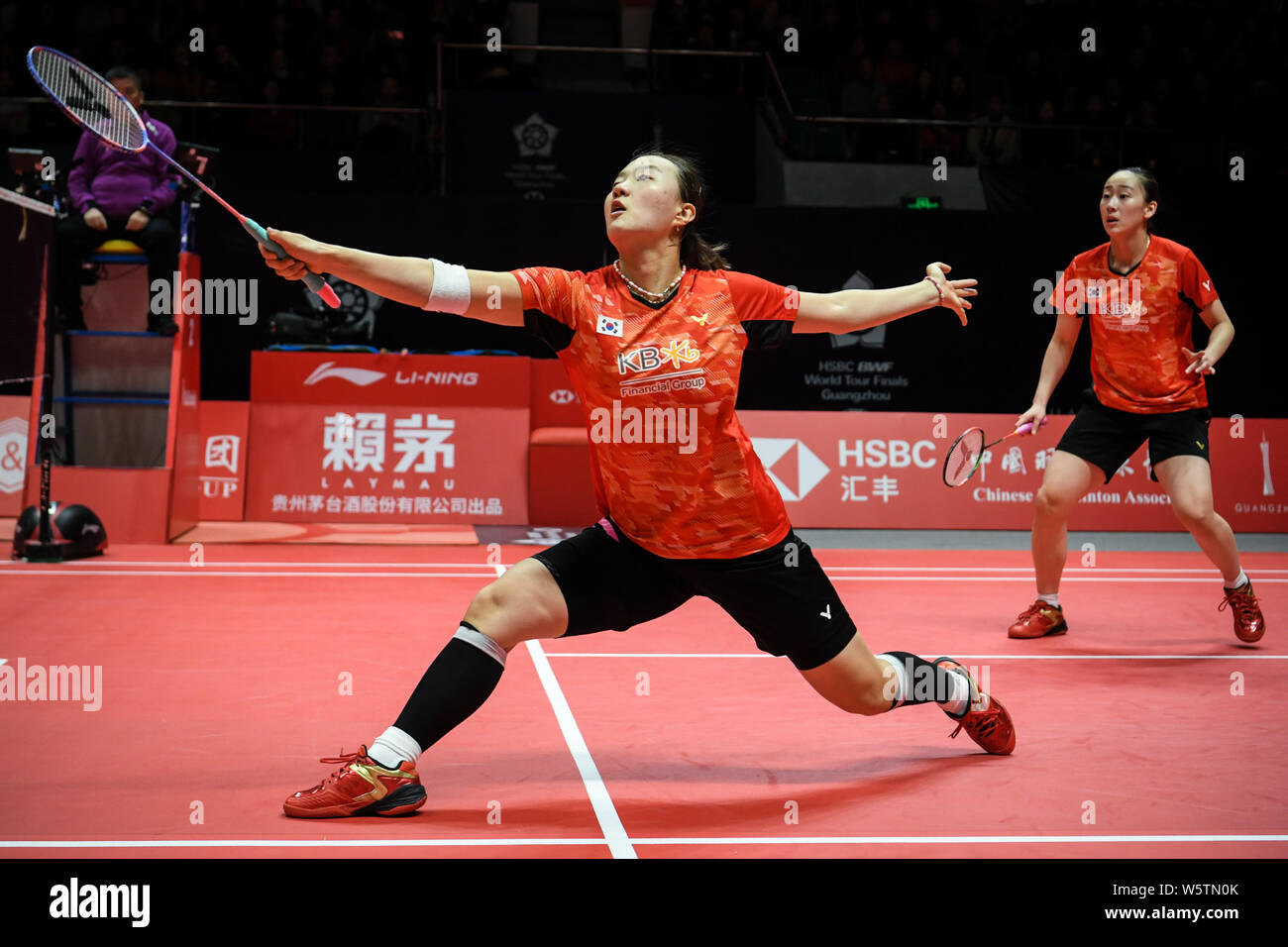 Lee So-hee and Shin Seung-chan of South Korea return a shot to Mayu ...