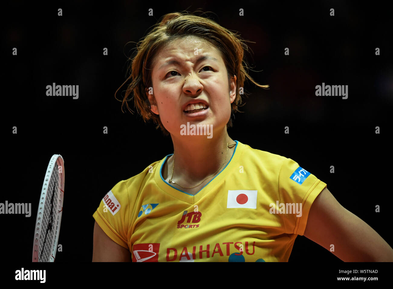 Nozomi Okuhara of Japan reacts as she competes against Michelle Li of ...