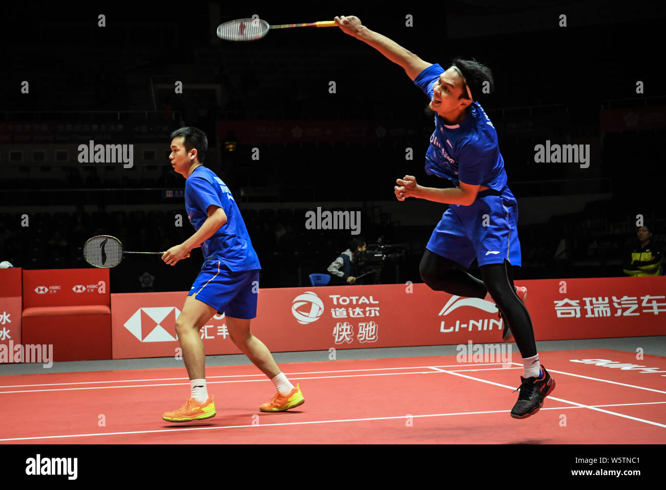 Hendra Setiawan and Mohammad Ahsan of Indonesia return a shot to ...