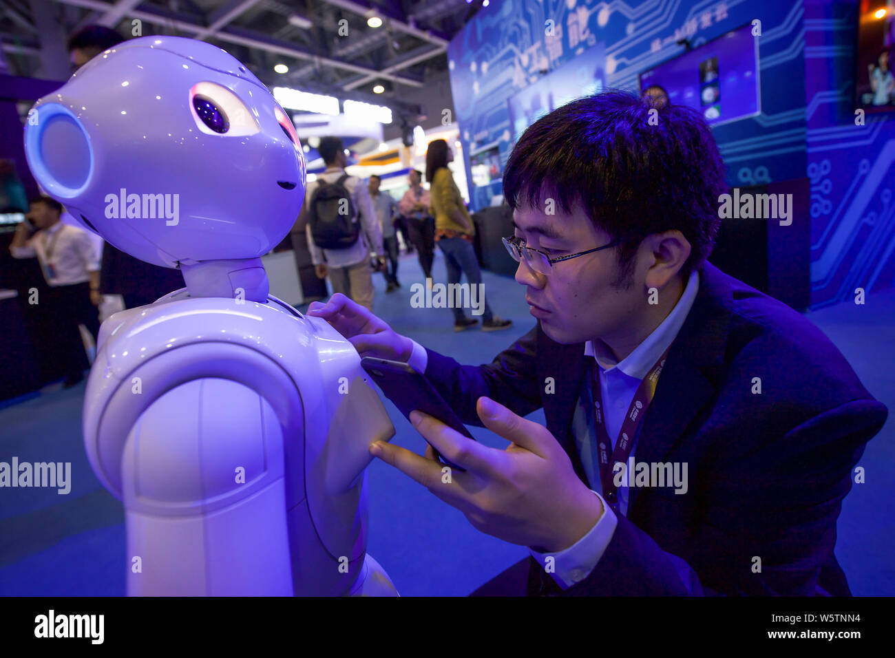 A guiding robot is pictured during the 6th China Mobile Global Partner ...