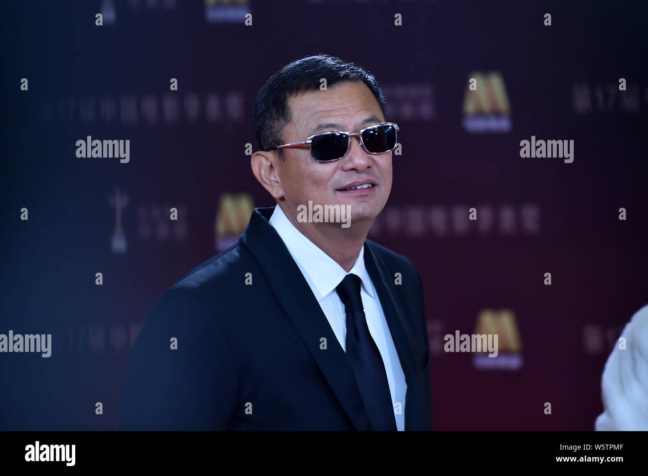 Hong Kong film director Wong Kar-wai poses as he arrives on the red ...