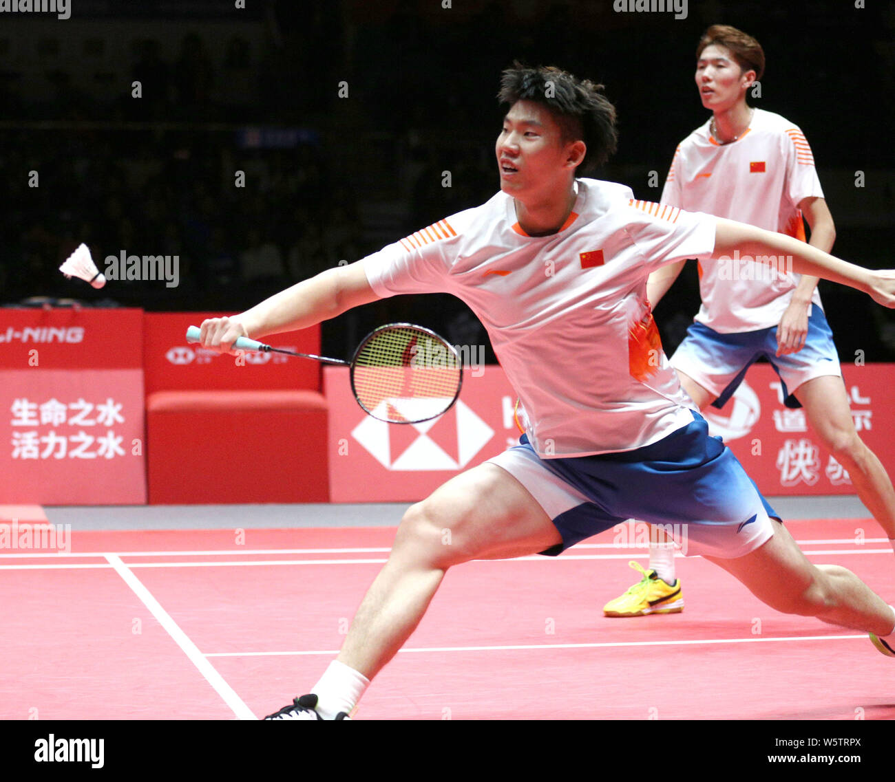 Li Junhui and Liu Yuchen of China return a shot to Hiroyuki Endo and ...
