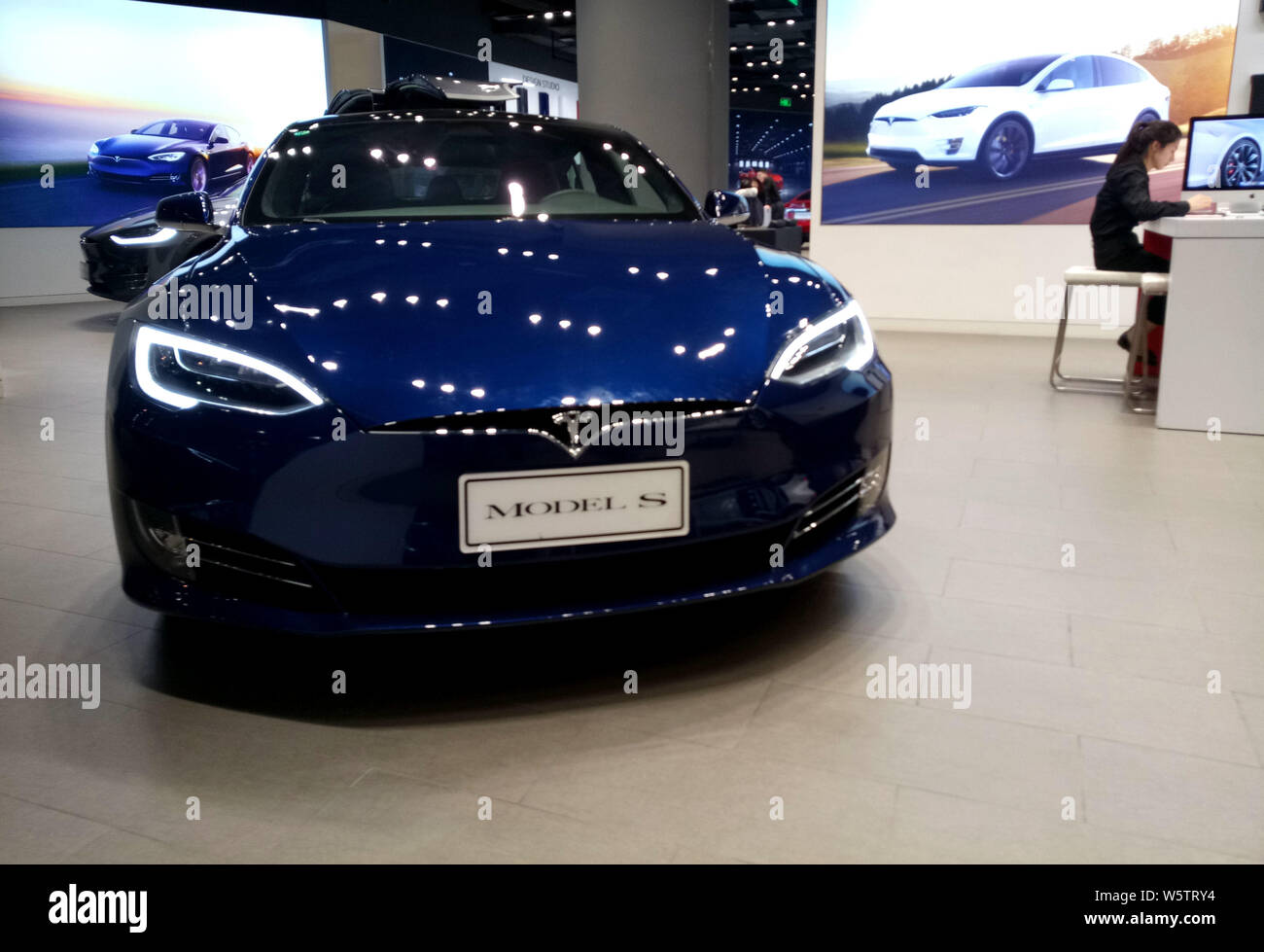 --FILE--A Tesla Model S electric car is on display at a store in ...
