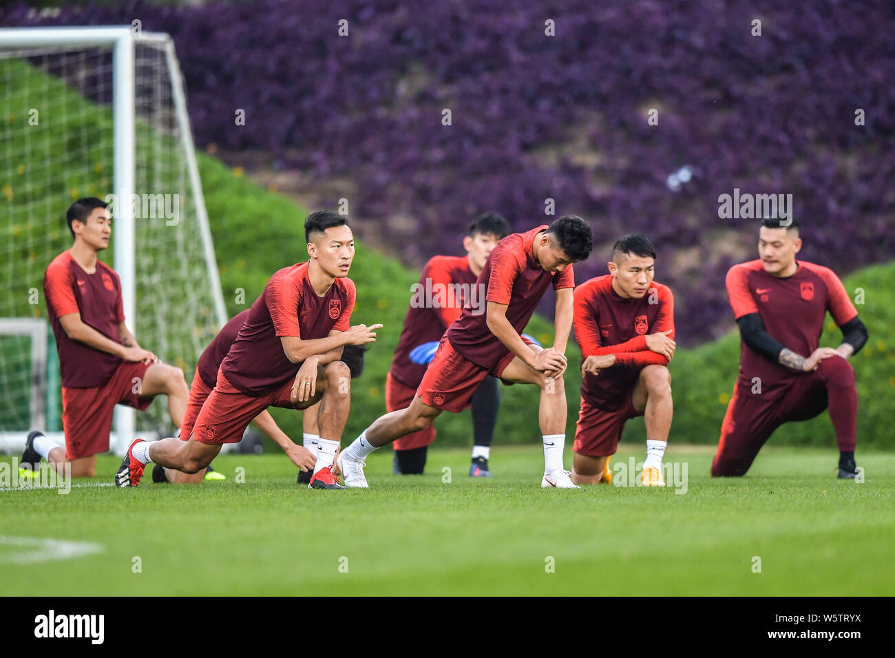 Players of the Chinese national men's football team takes part in a ...