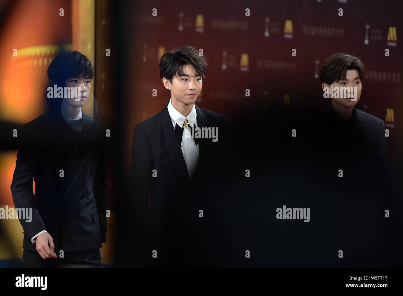(From left) Jackson Yee or Yi Yangqianxi, Karry Wang or Wang Junkai, and Roy Wang or Wang Yuan ...