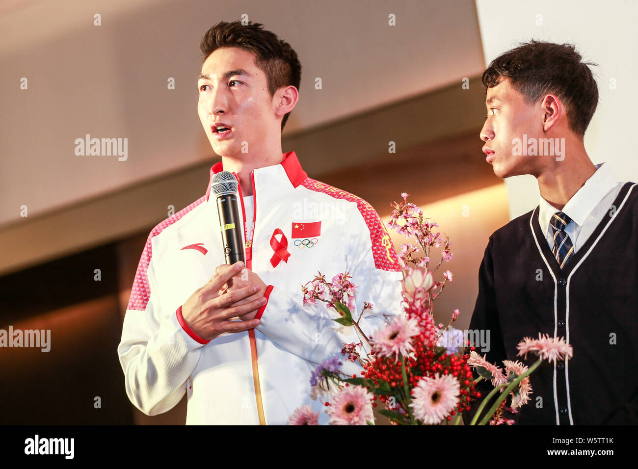 Chinese short track speed skater Wu Dajing, the winner of the men's 500 ...