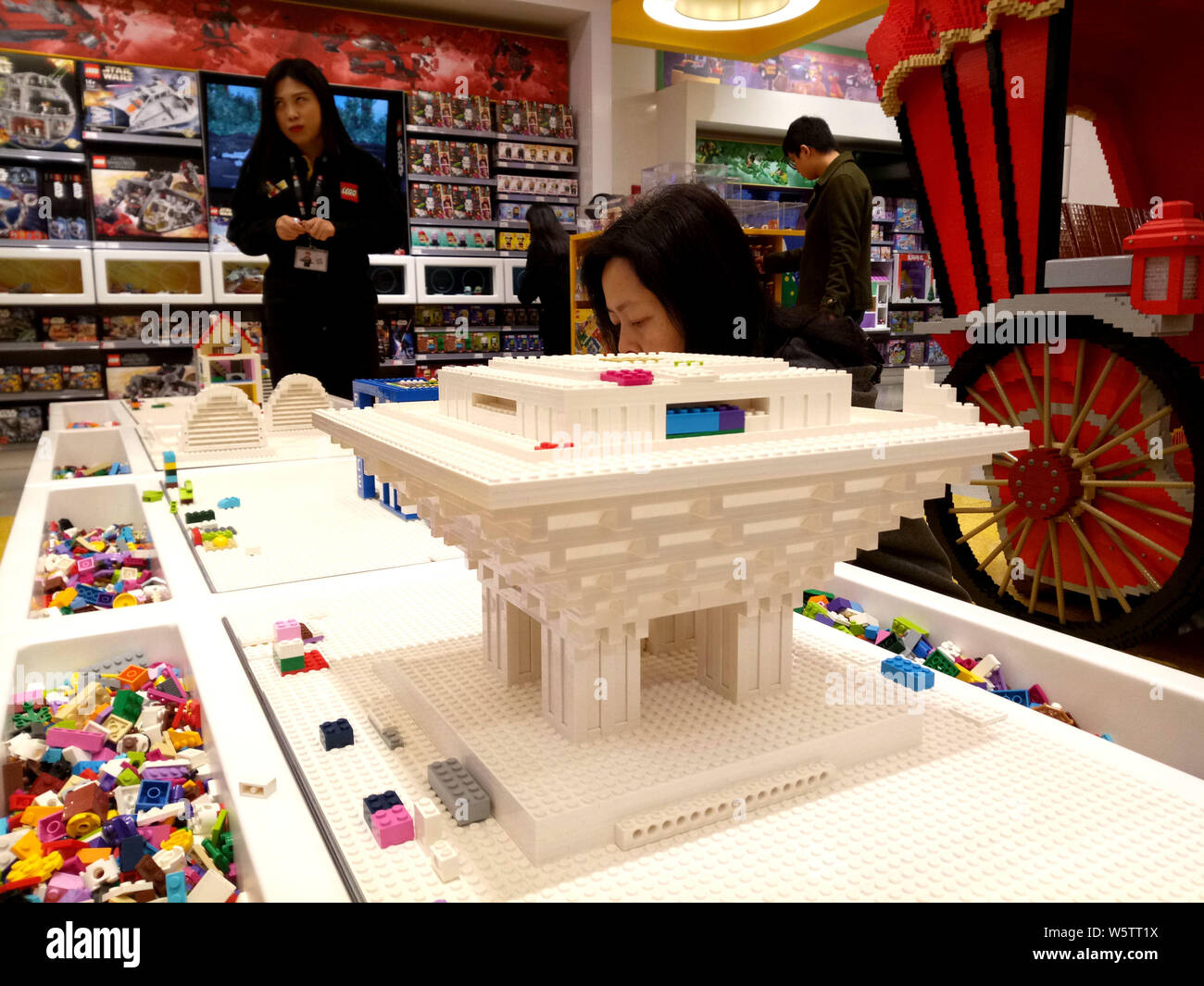 A model of the Chinese Hall at the World Expo made of Lego items is ...