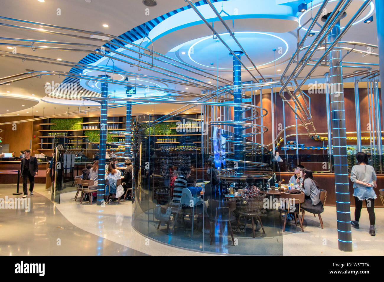 Customers dine in the world's tenth and Asia's third spaceship-themed ...