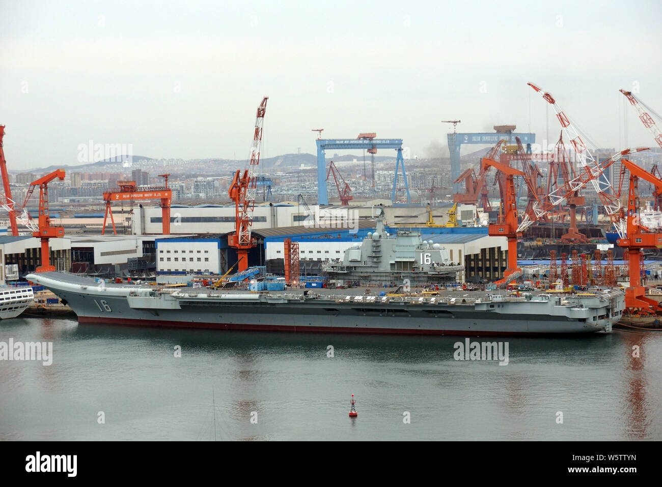 --FILE--China's first aircraft carrier The Liaoning is docked at the ...