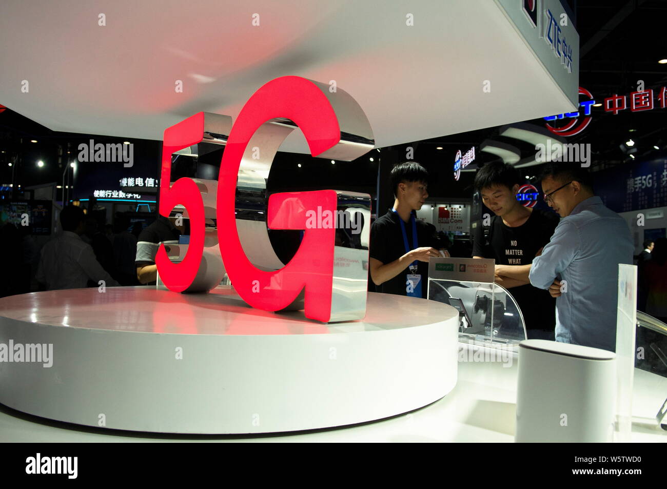 A logo of 5G is seen at the stand of Qualcomm during an expo in ...