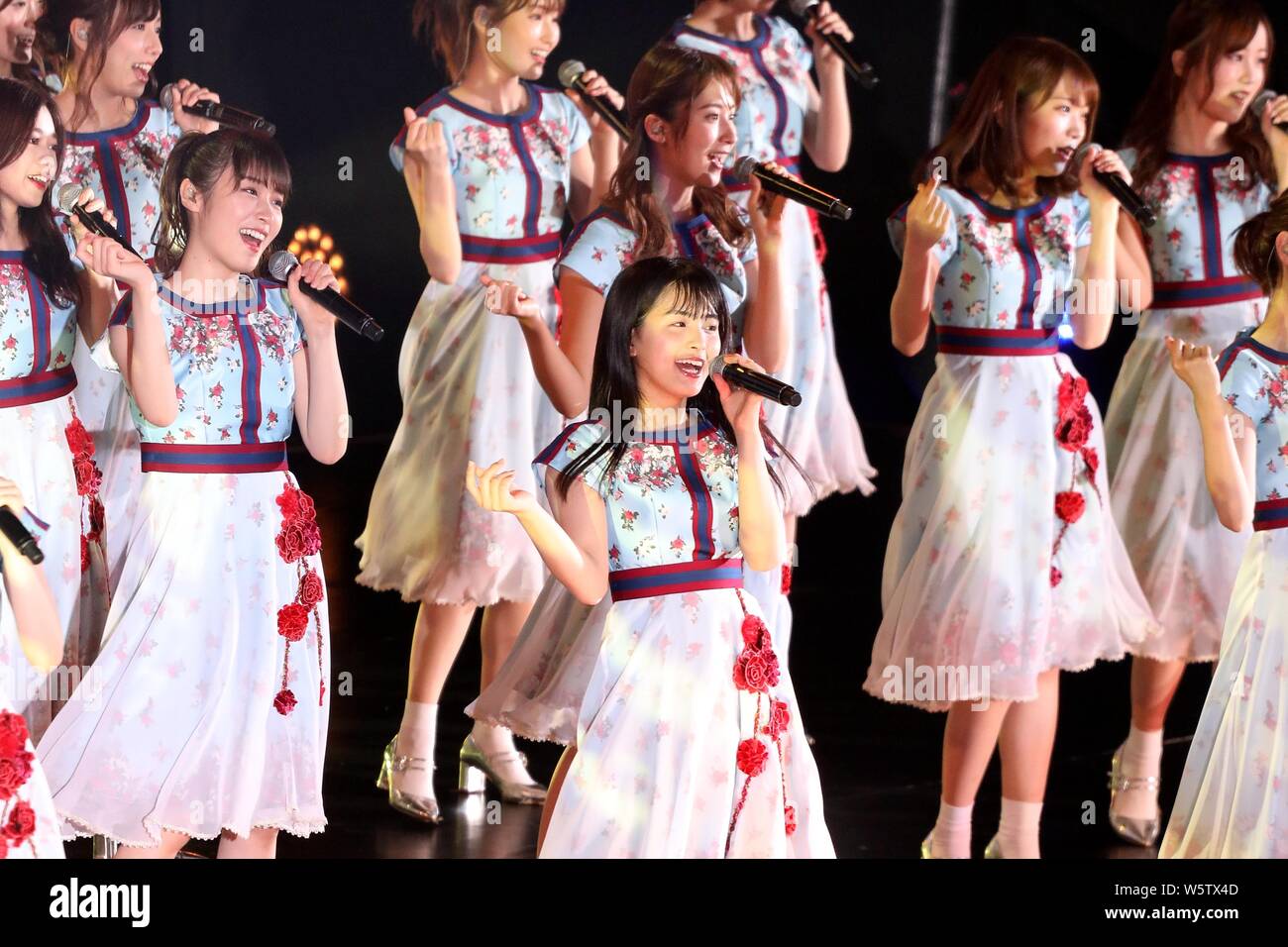 Members of Japanese girl idol group Nogizaka46 perform during their ...