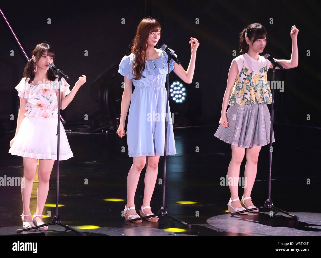 Members of Japanese girl idol group Nogizaka46 perform during their ...