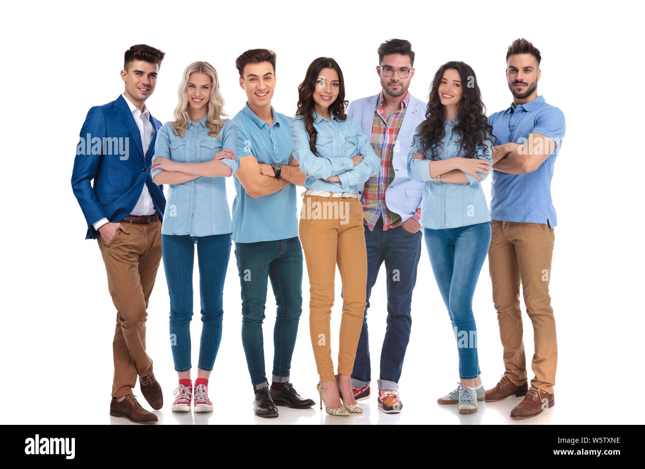 Group of seven people standing hi-res stock photography and images - Alamy
