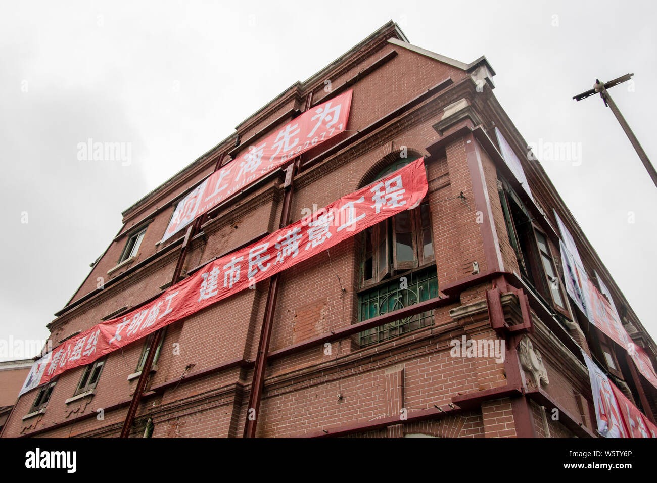 A 116-year-old housing block is pictured after being moved to make way ...