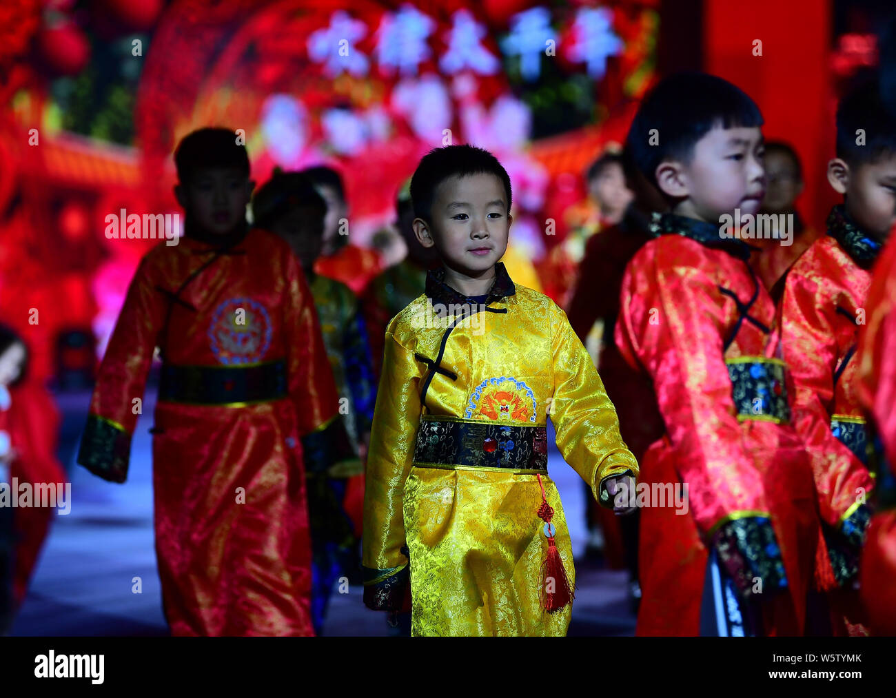 Young models present new creations of cheongsam (qipao) made of ...