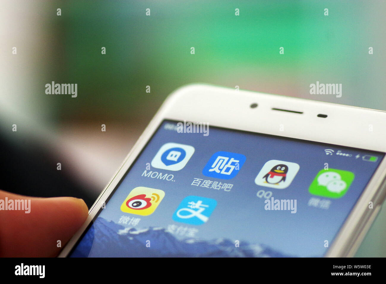 Chinese mobile phone user hi-res stock photography and images - Alamy