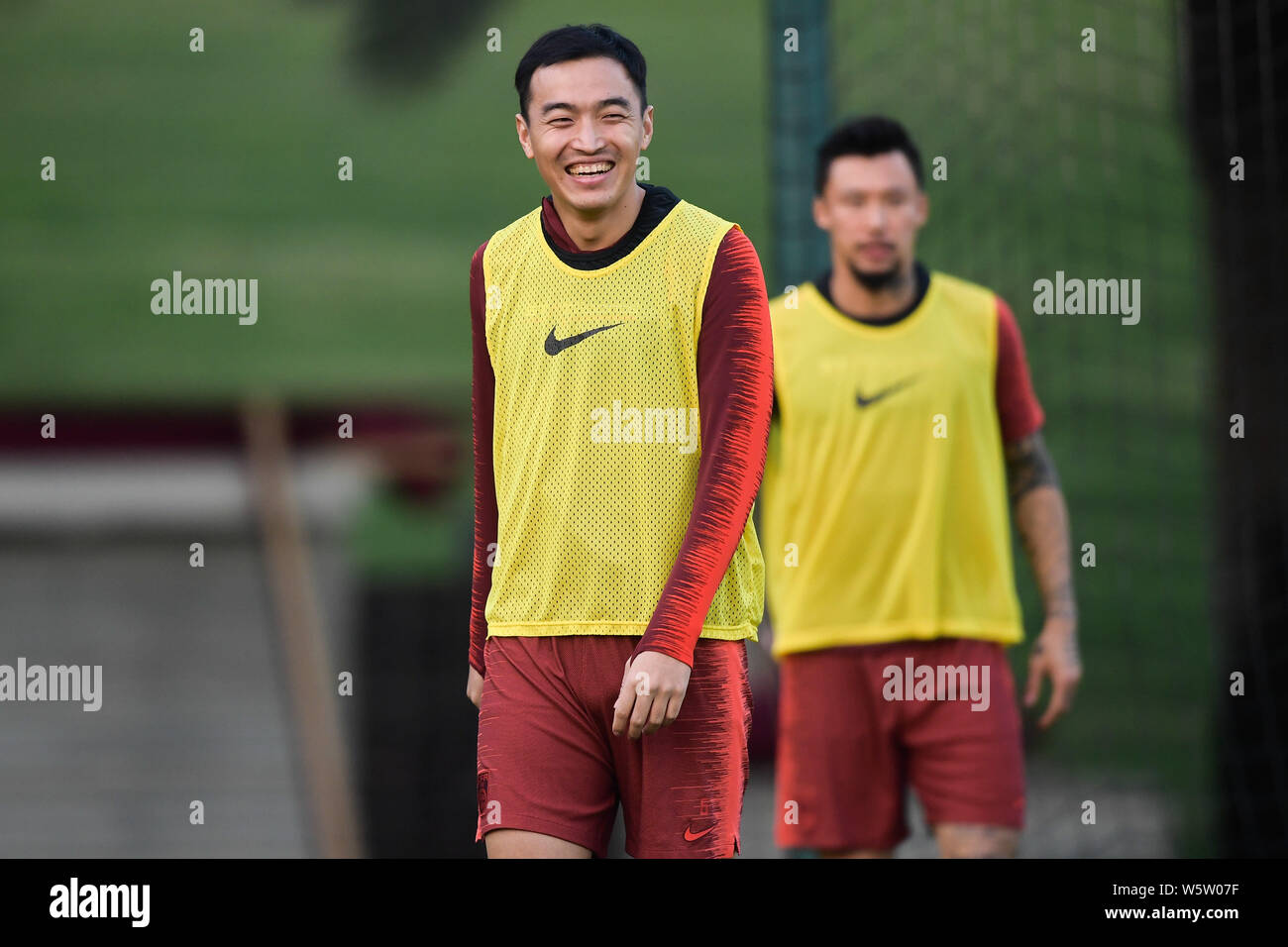 Members of the Chinese national men's football team take part in a ...