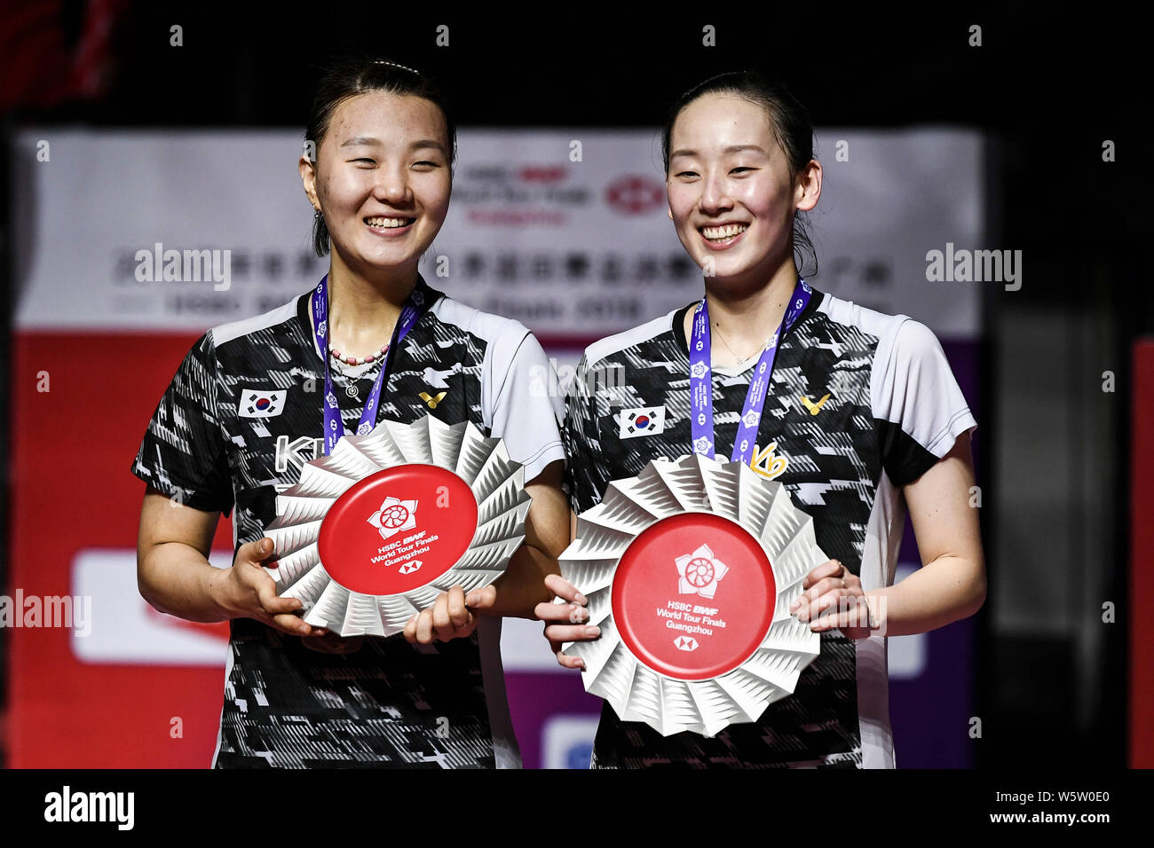 Lee So-hee/Shin Seung-chan of South Korea pose with their trophies ...