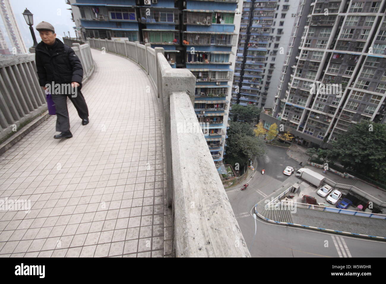 A 40-meter-high pedestrian overpass supported by one concrete column ...