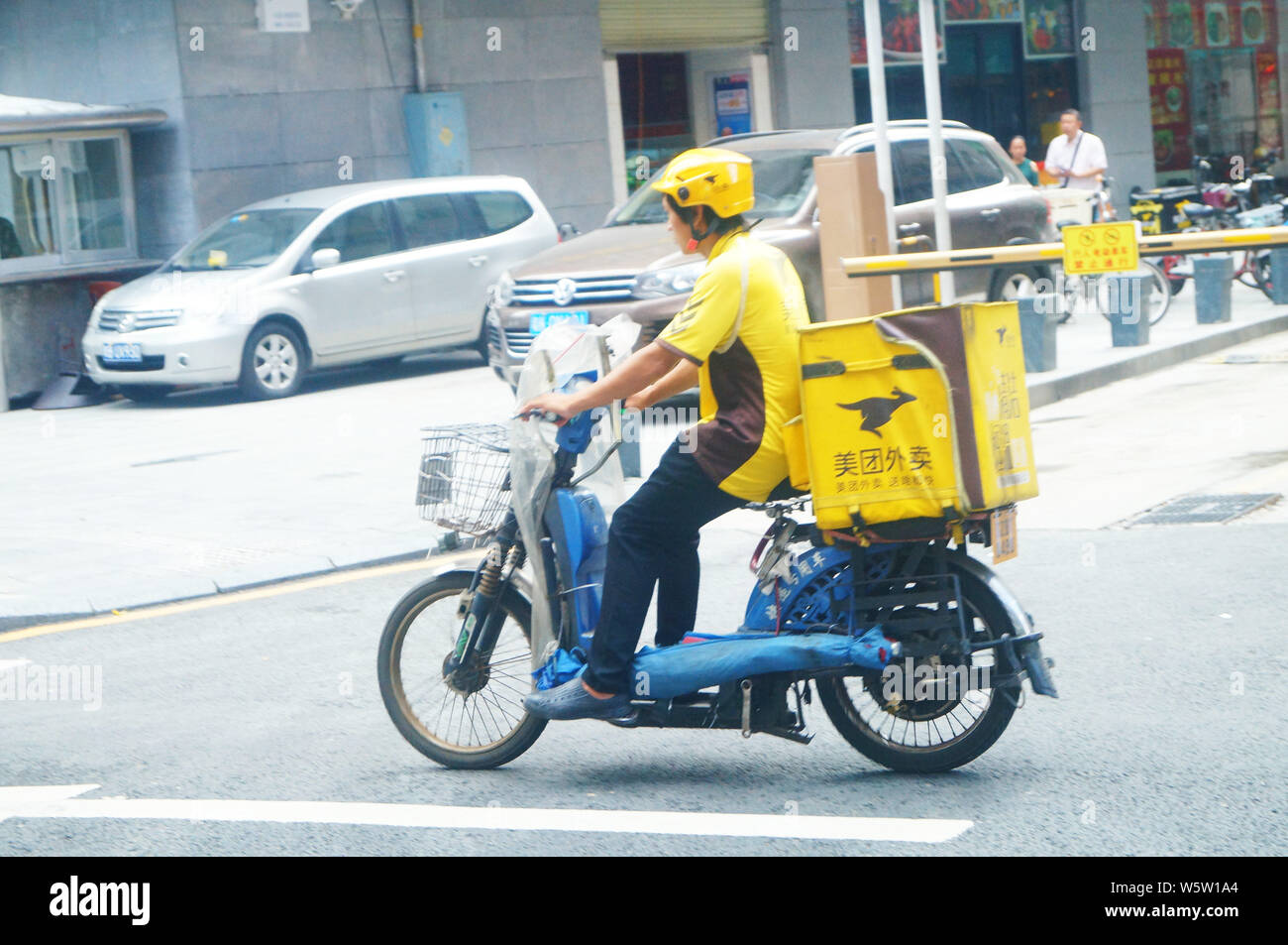 --FILE--A food delivery courier of Chinese meal delivery company ...