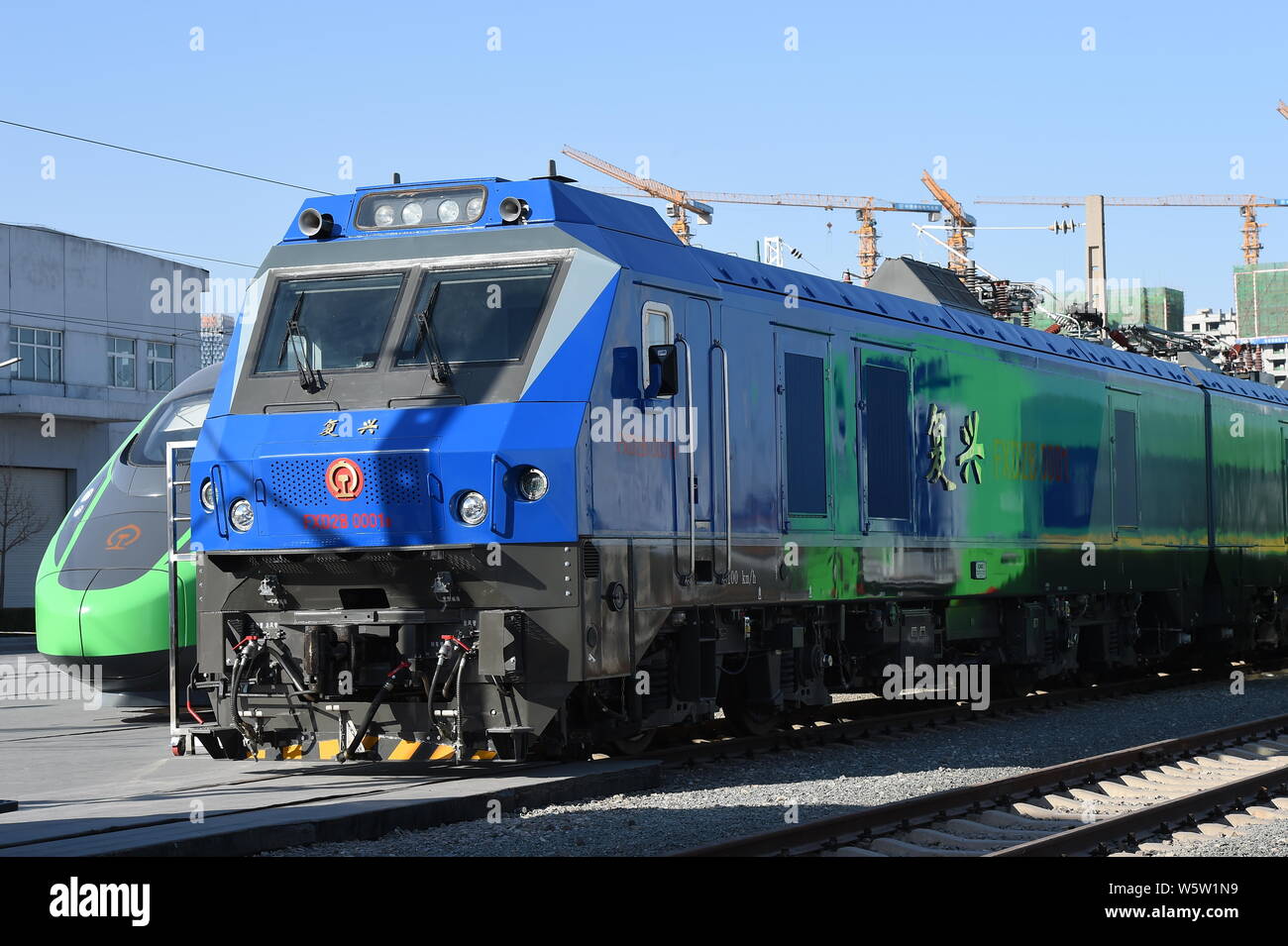 One of the newly developed Fuxing bullet trains is shown at an ...
