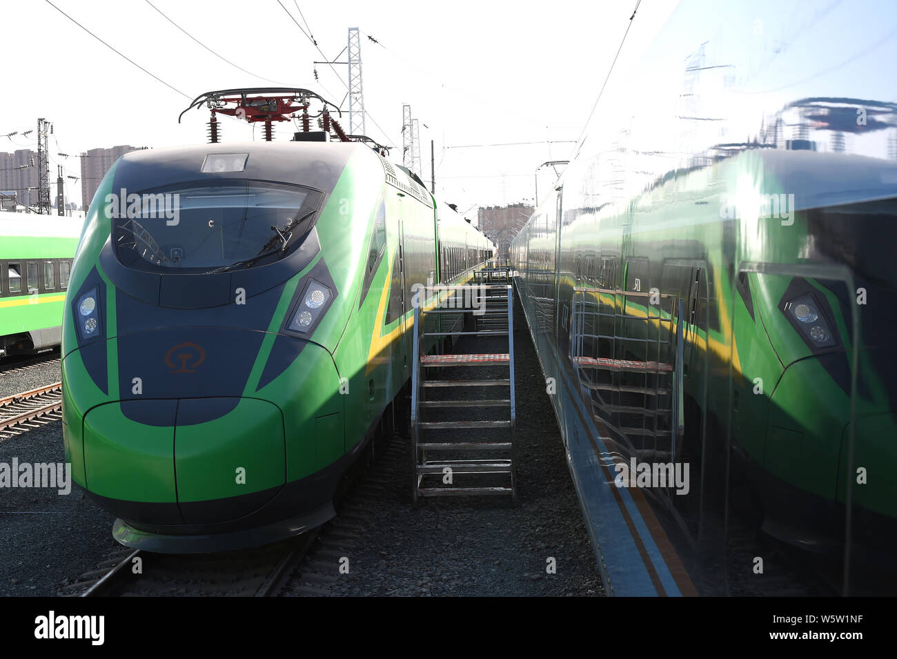 The newly developed Fuxing bullet trains are shown at an exhibition in ...