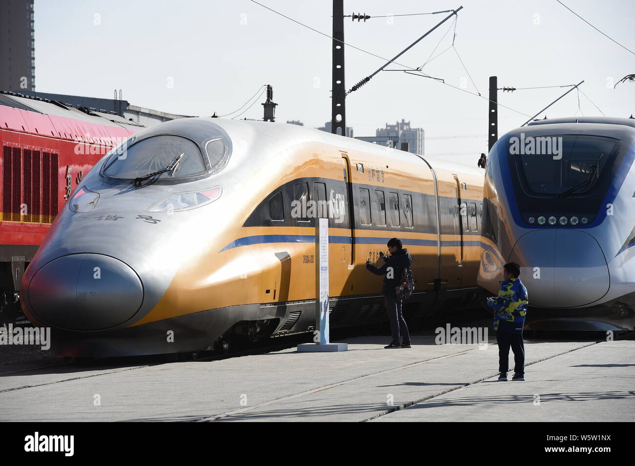 The newly developed Fuxing bullet trains are shown at an exhibition in ...