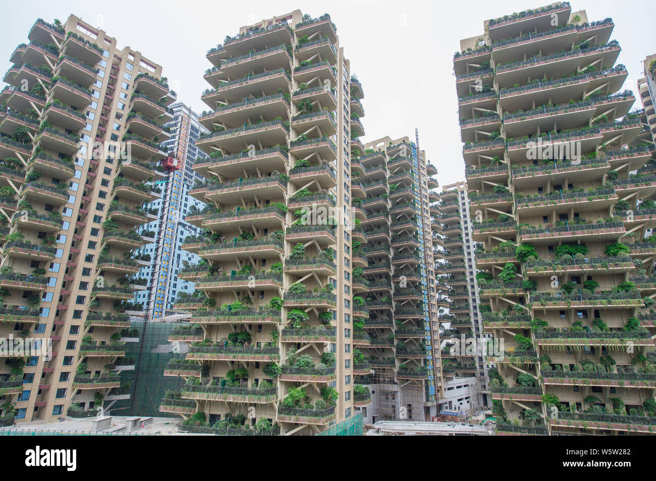 The balconies of newly-constructed residential buildings are decorated ...
