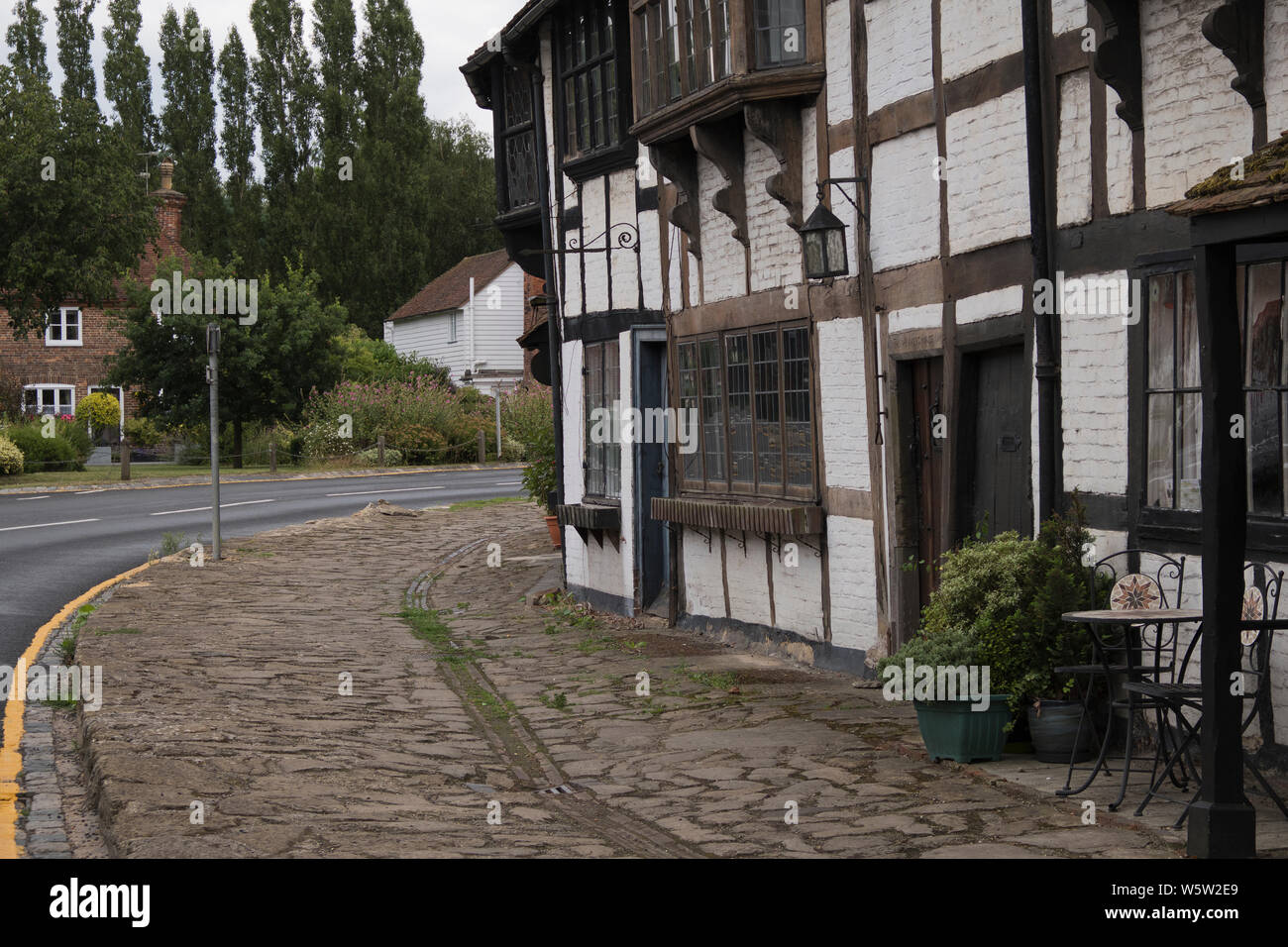 Original 1400s and Tudor buildings and pavement along Biddenden high ...