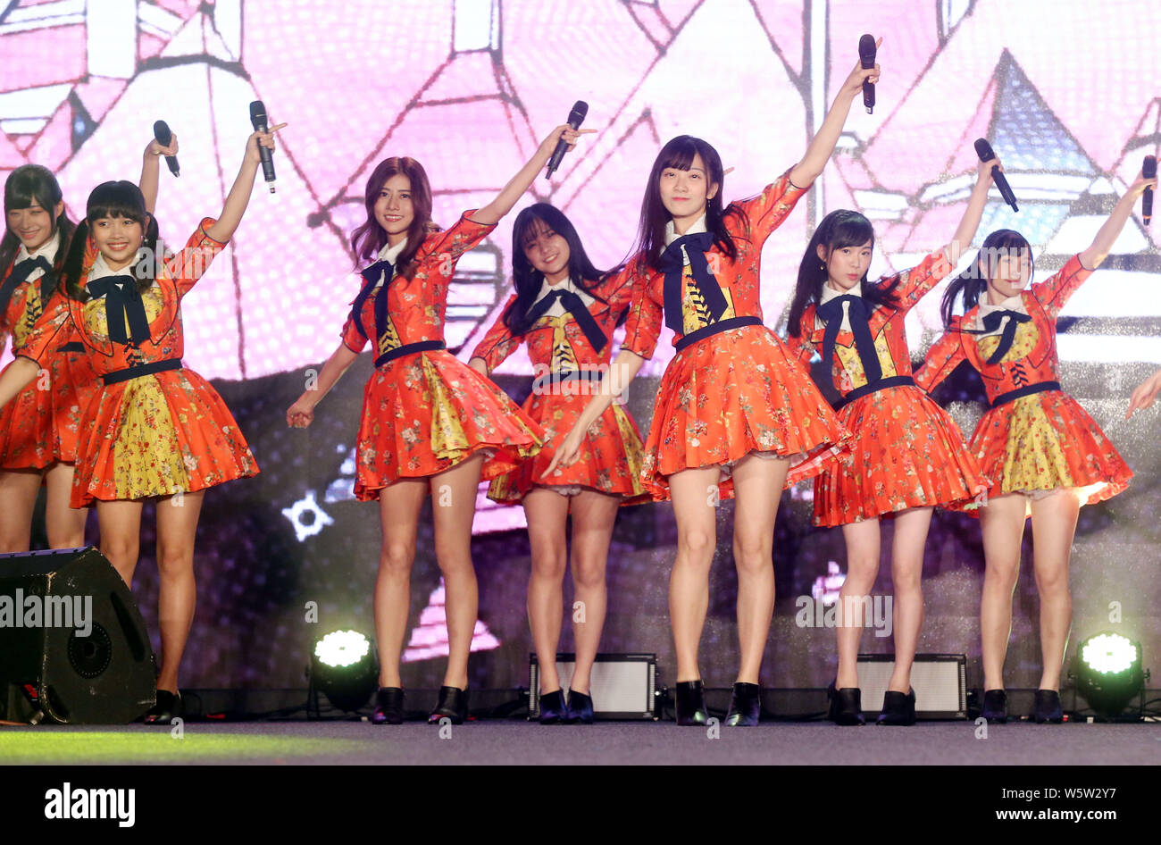 Members of Taiwanese idol girl group AKB48 Team TP perform during a ...